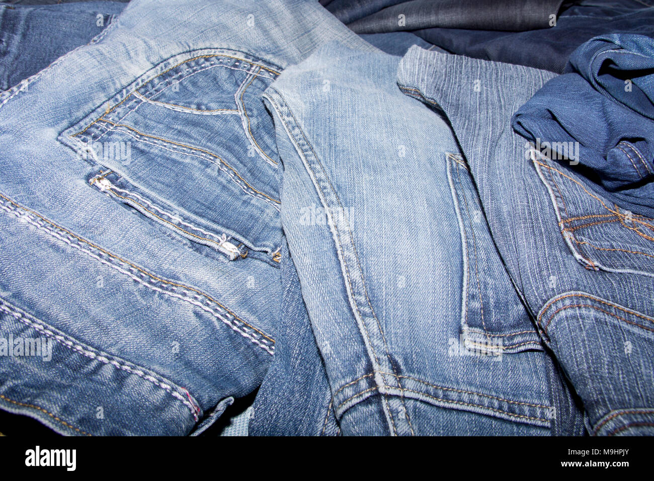 Pile of jeans ready for recycling Stock Photo - Alamy