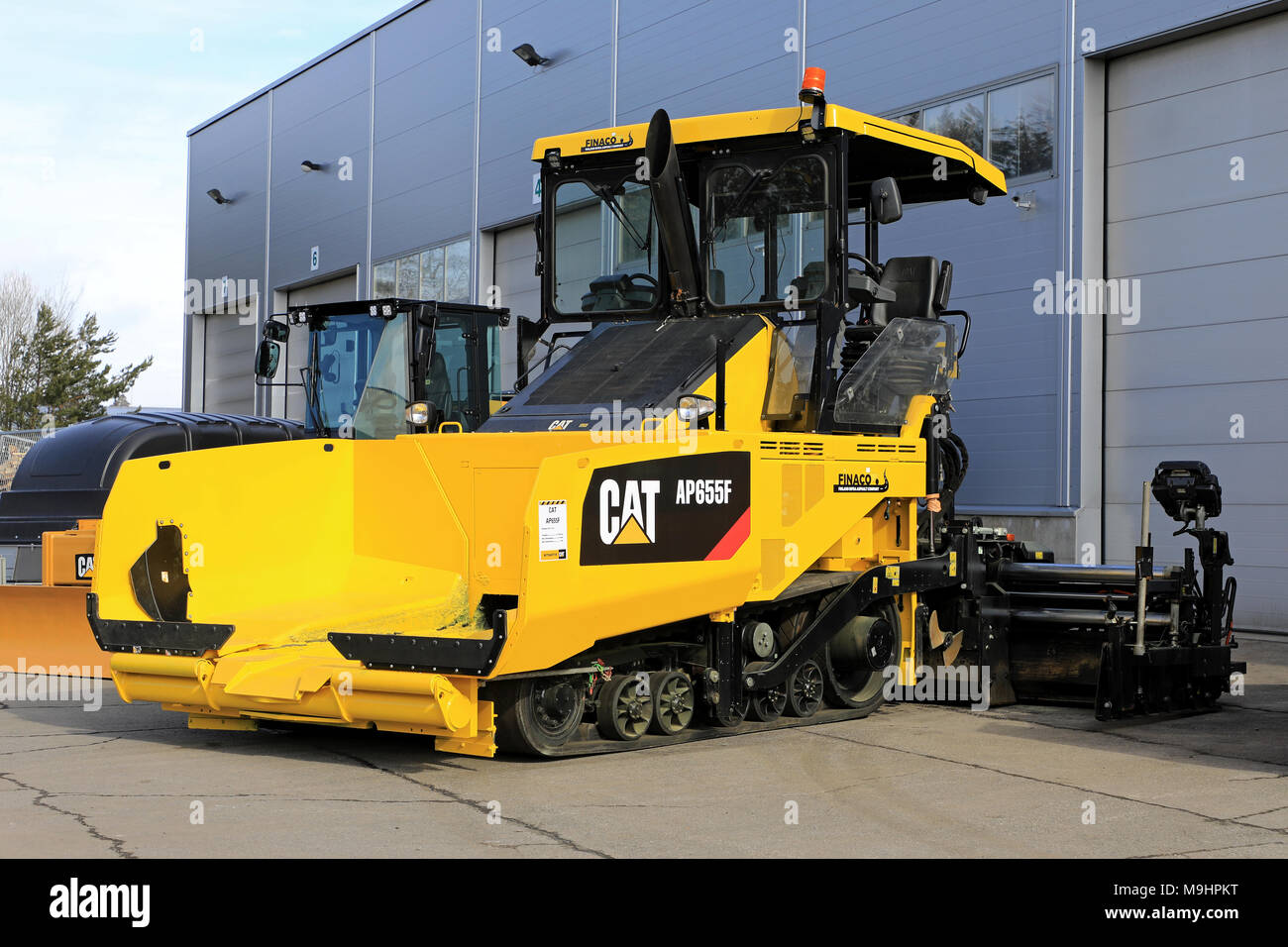 LIETO, FINLAND - MARCH 24, 2018: New Cat AP655F rubber tracked asphalt ...