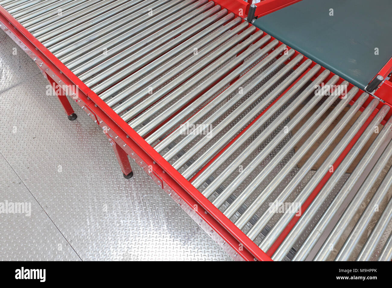 Top View of Conveyor Rollers in Warehouse Stock Photo - Alamy
