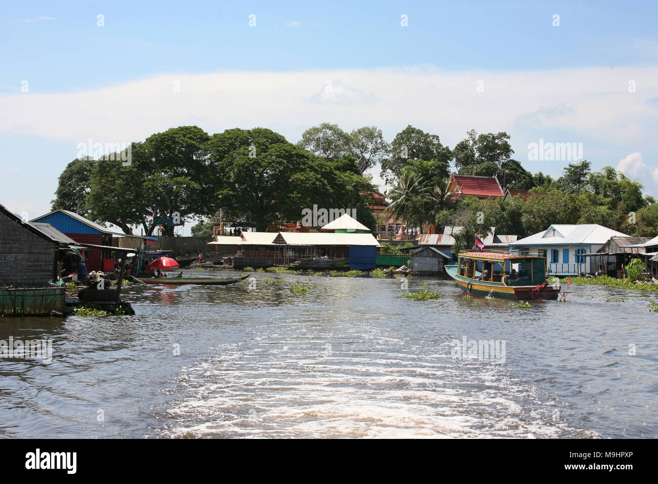Little pagoda on the island in Phumĭ Mé Chrey floating village on Tonlé ...