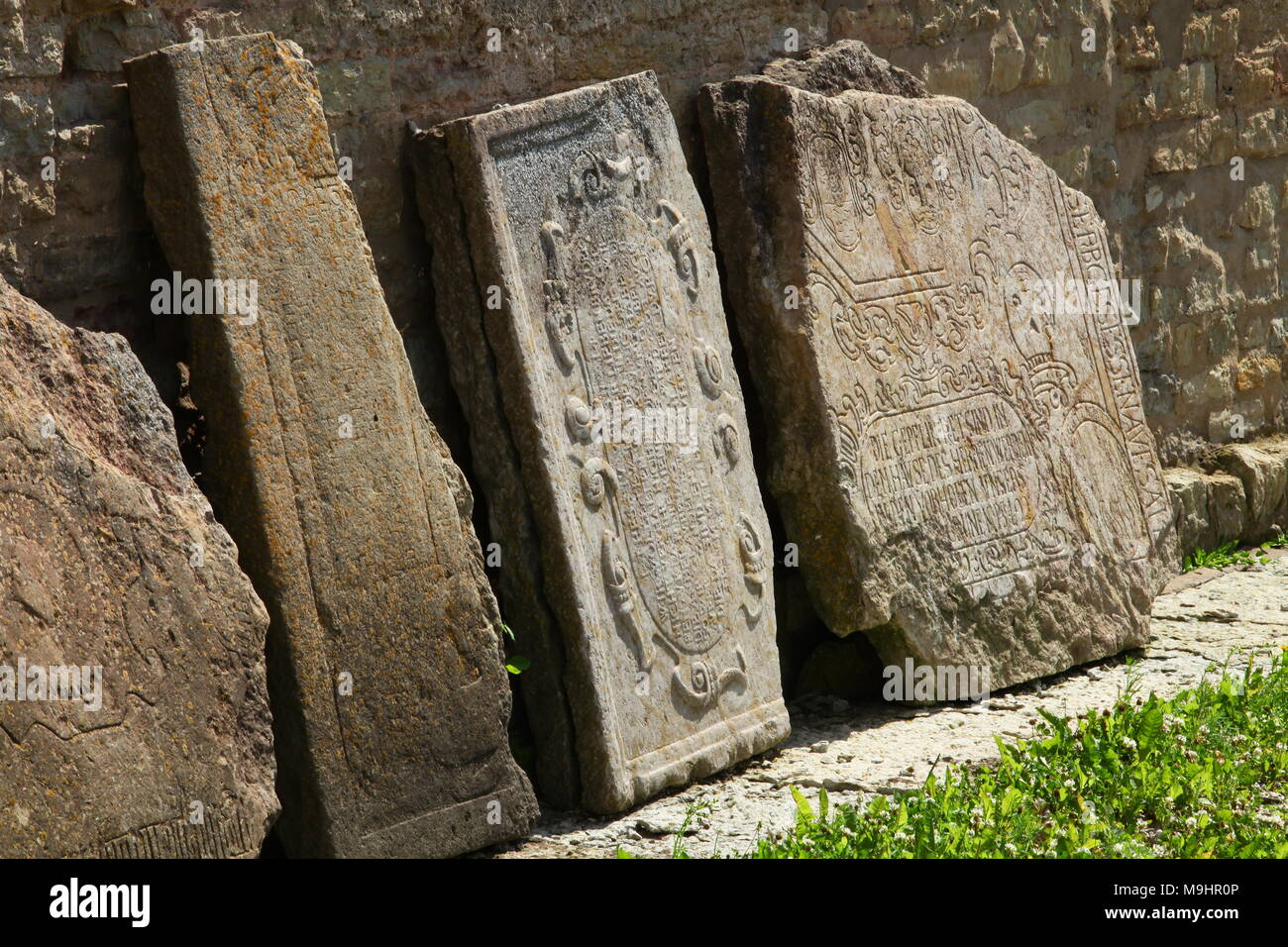broken gravestone in the old cemetery close to Stock Photo - Alamy