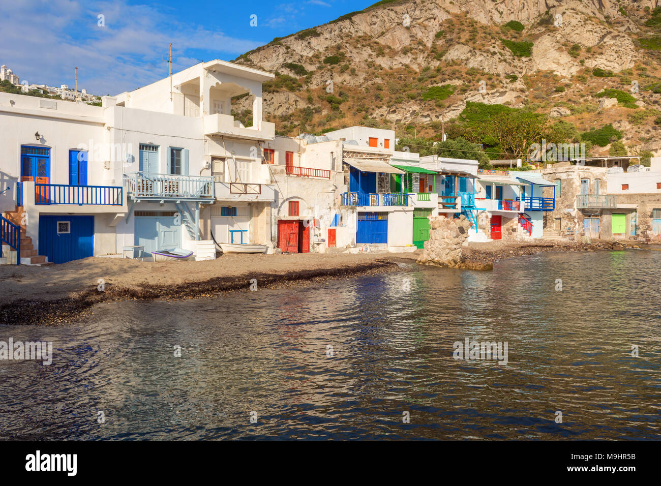 Traditional Greek houses with coloured wooden doors in Klima village on ...