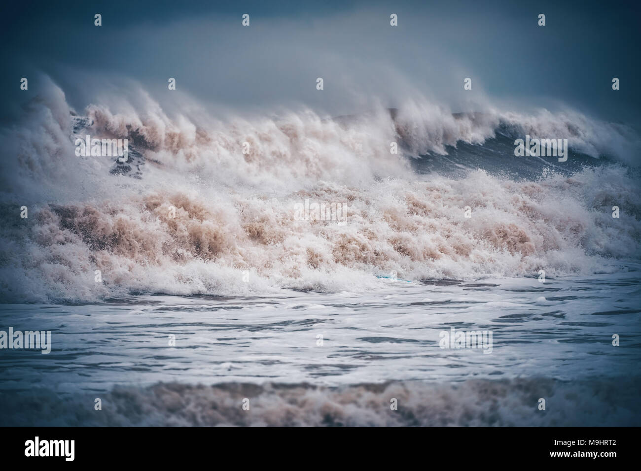 Huge waves in the deep sea water after sunset Stock Photo - Alamy
