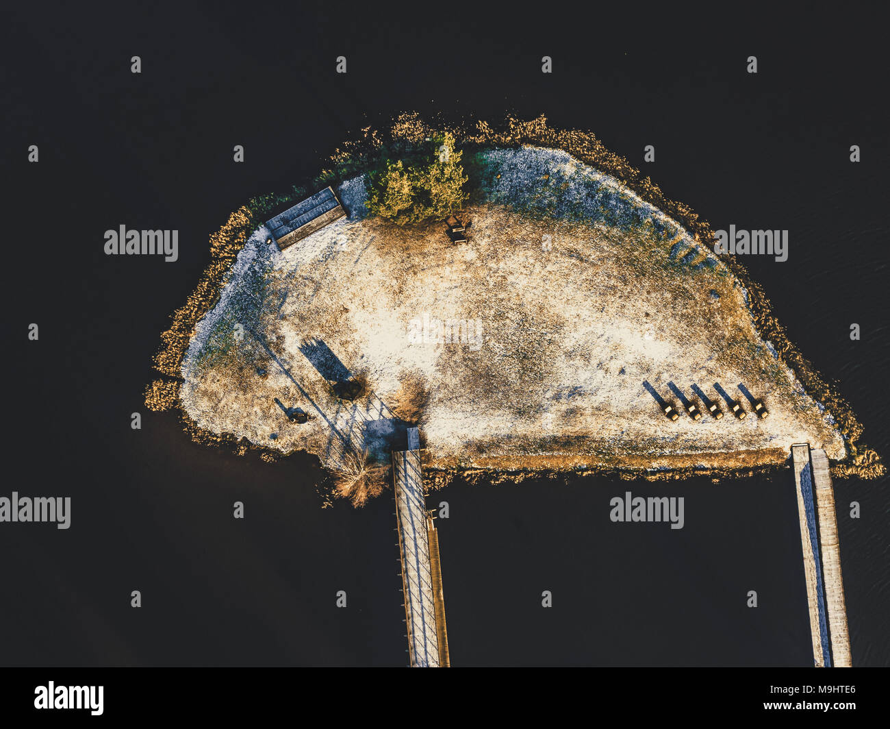 Aerial Photography of a Partly Snowy Isolated Island in Sunny Winter ...