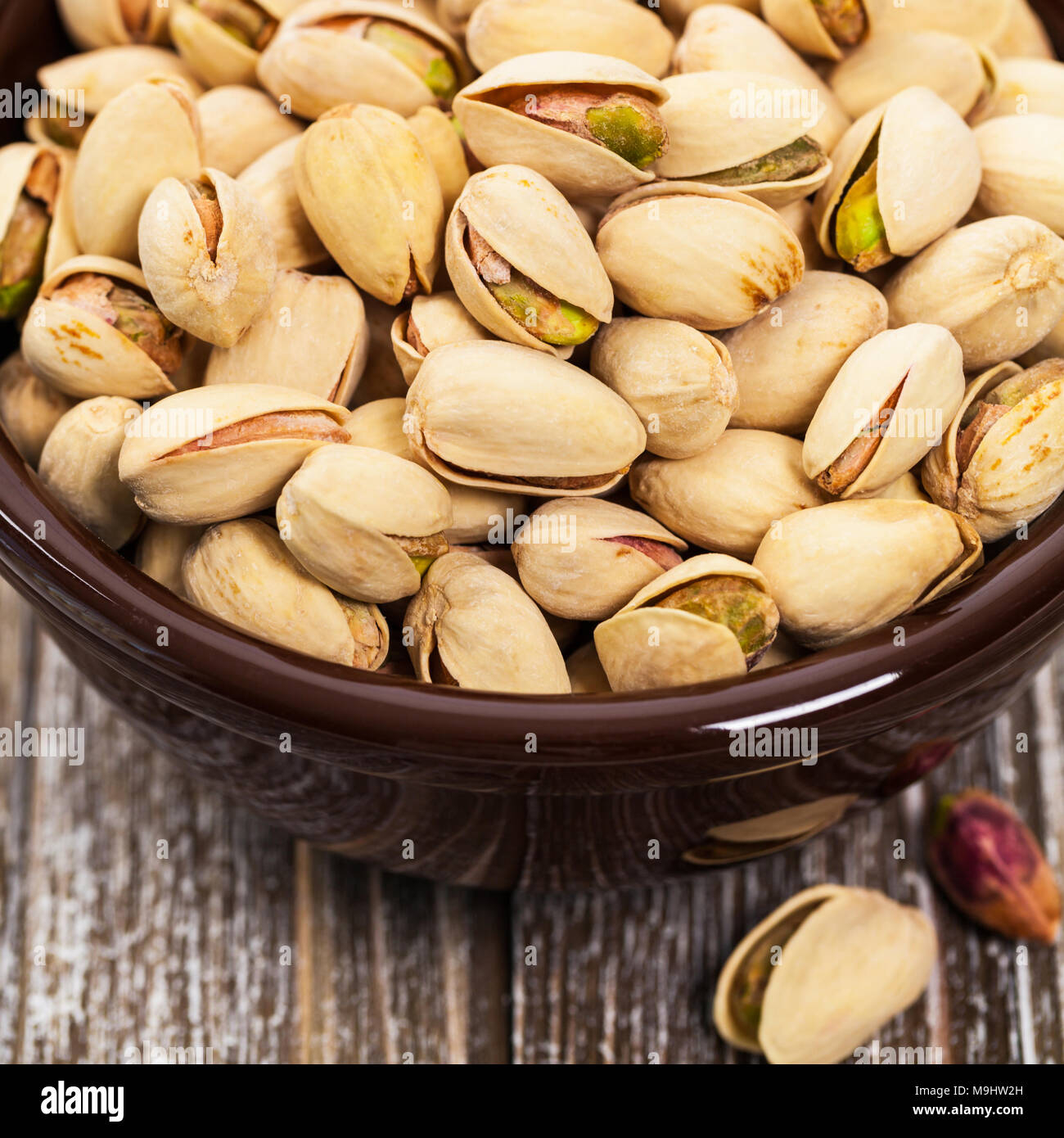 Sea Salt Roasted Pistachios Background. Macro. Selective focus Stock Photo - Alamy