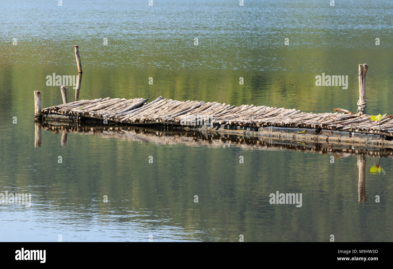 Old Wooden bridge over lake Stock Photo - Alamy