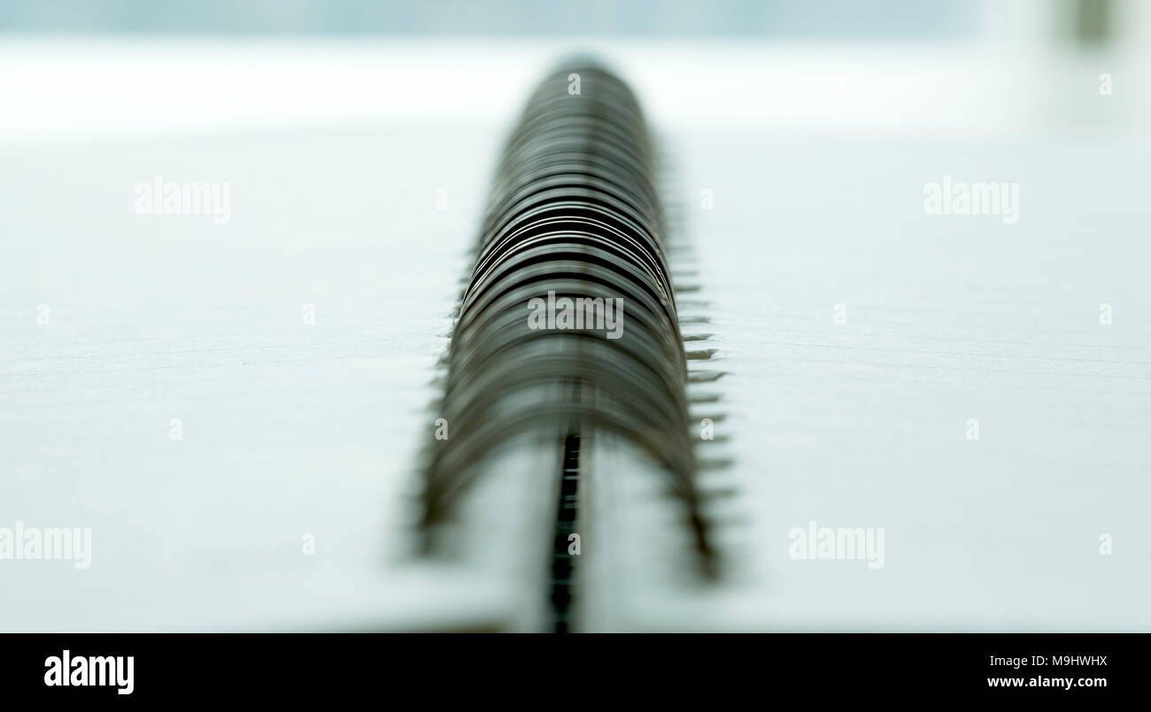 Extreme closeup of a spiral notebook closeup notepad as mockup for your ...