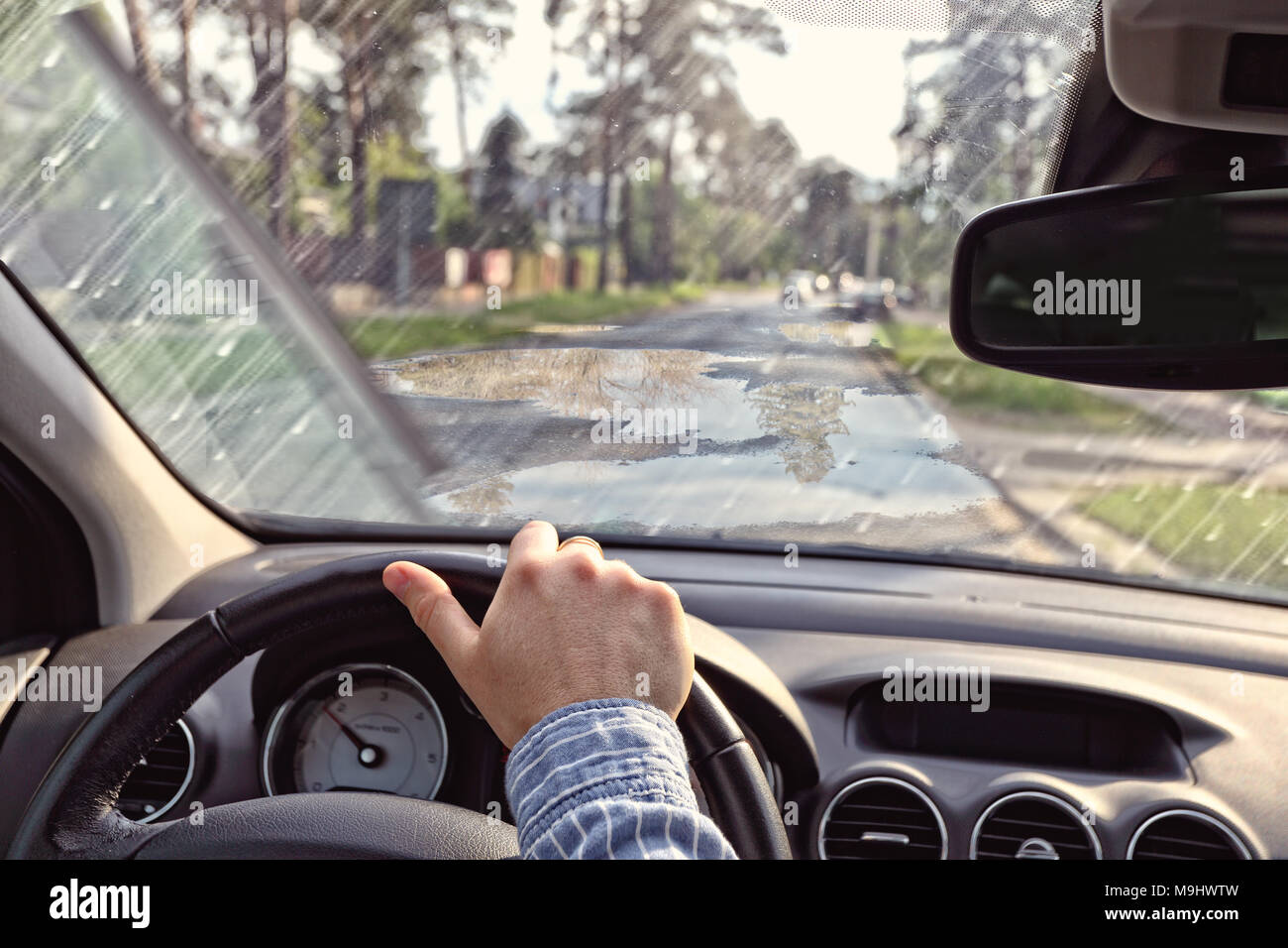 driving a car on a rainy day Stock Photo - Alamy