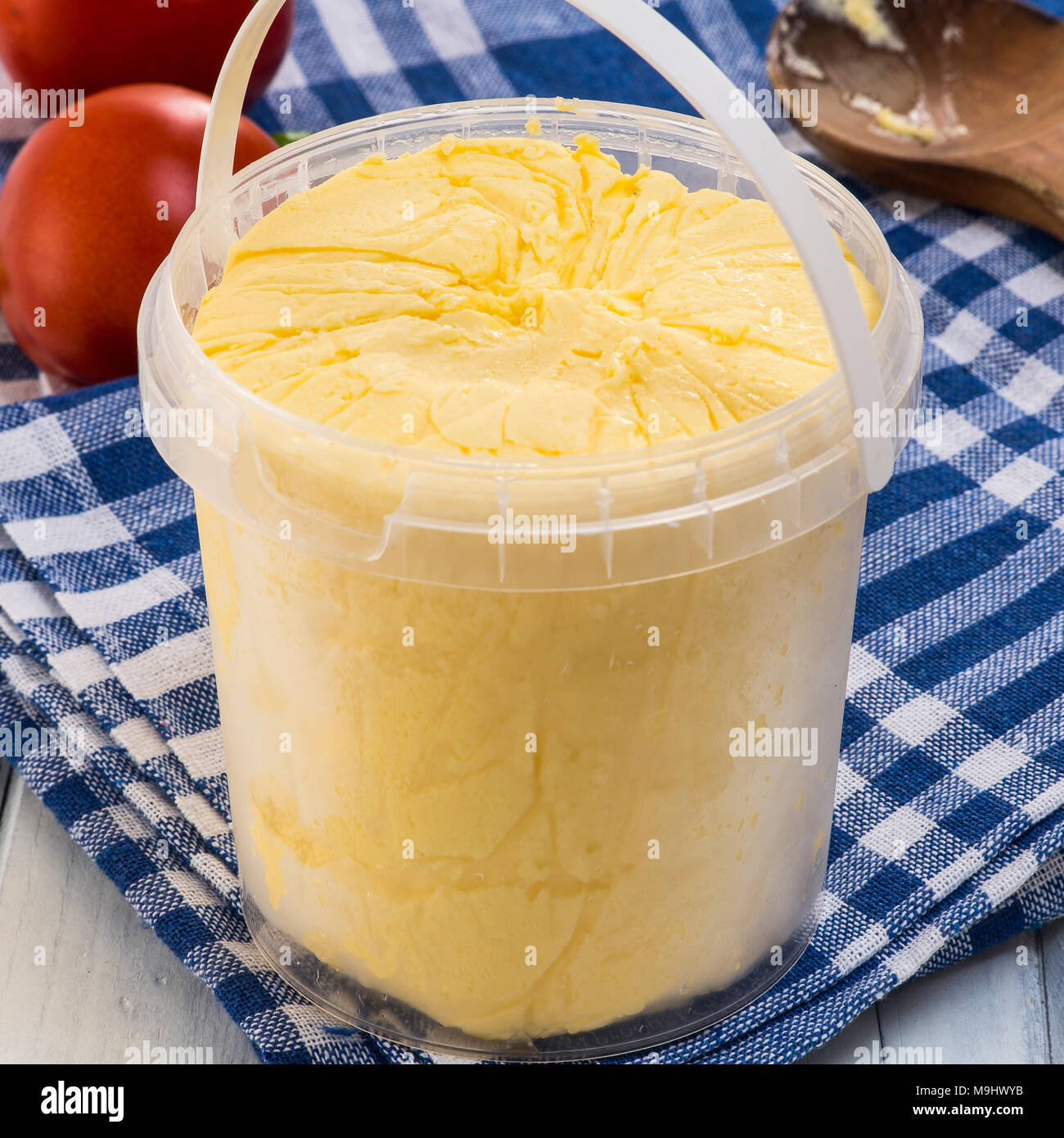 block of fresh organic butter on a wooden board Stock Photo - Alamy