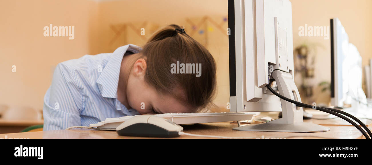Portrait of tired business woman fell asleep on computer keyboard Stock ...