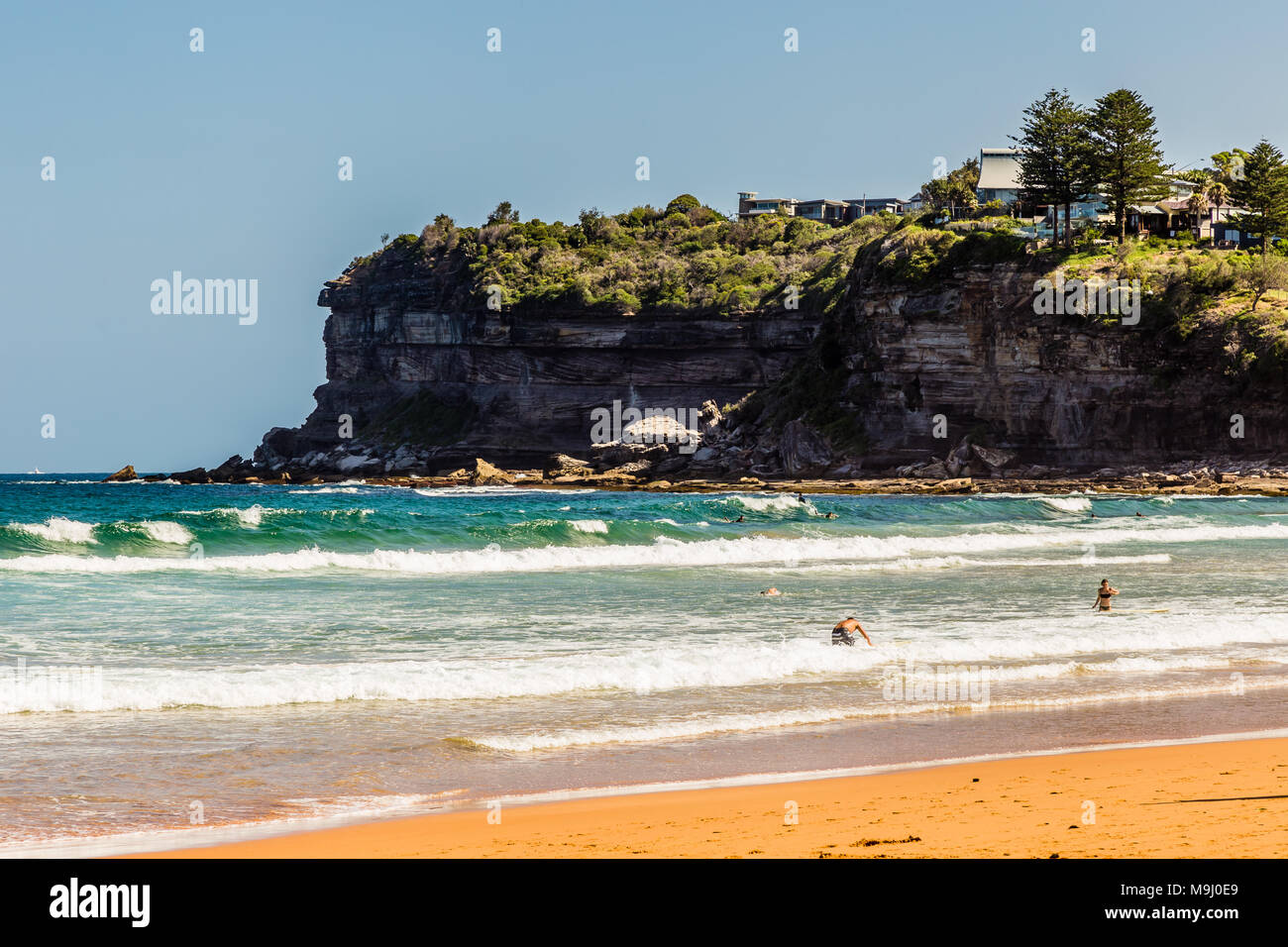 Surfing waves on Avalon Beach, NSW, Australia. January 04, 2018 Stock ...