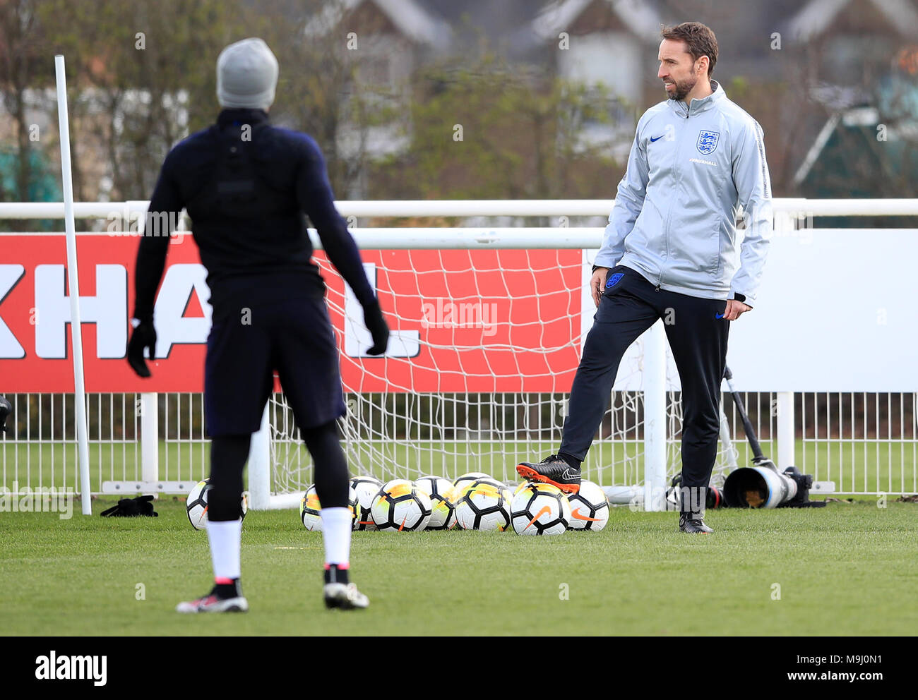 England Manager Gareth Southgate (right) during a training session at ...