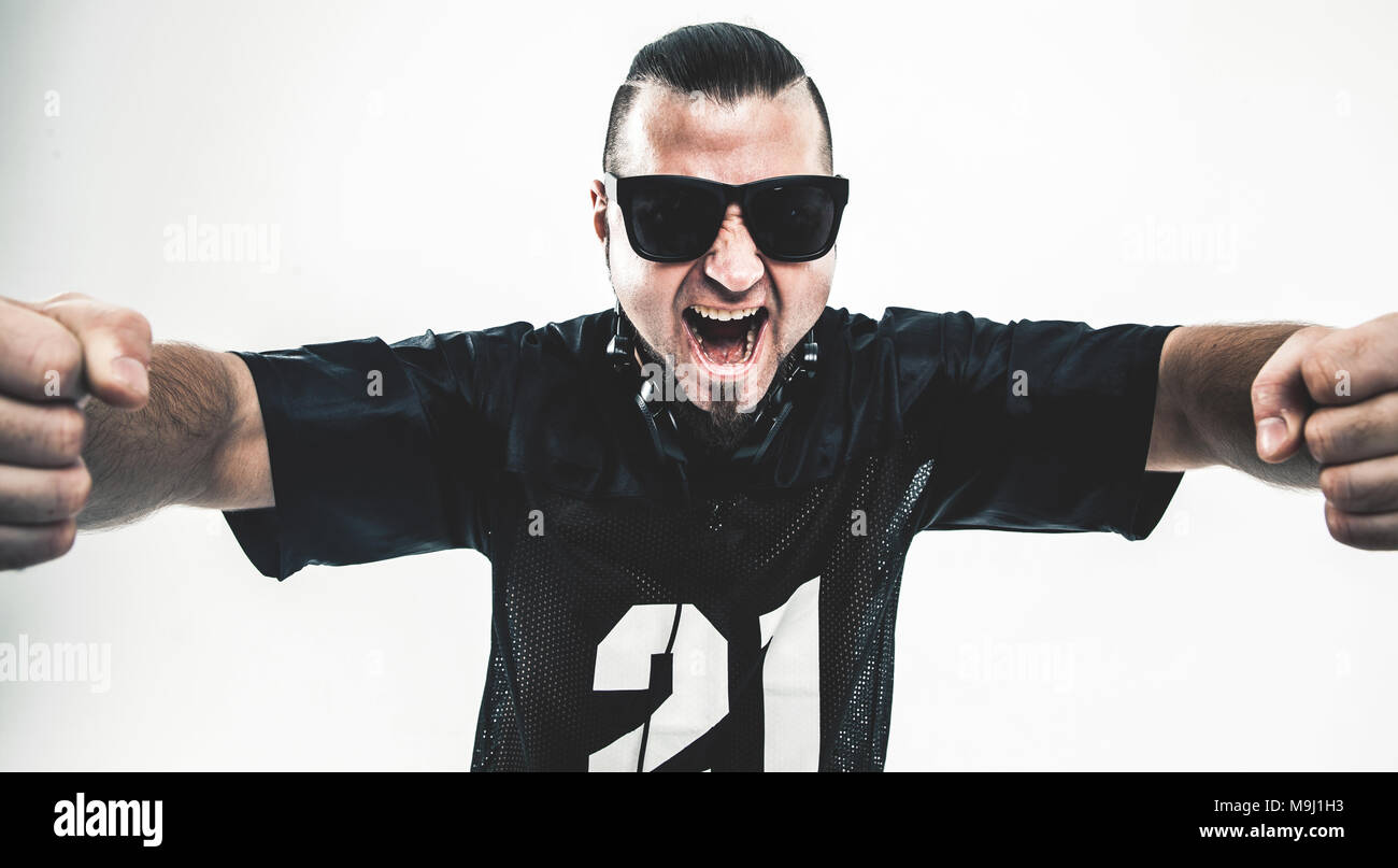 portrait of a badass rapper with sunglasses and headphones on a Stock ...