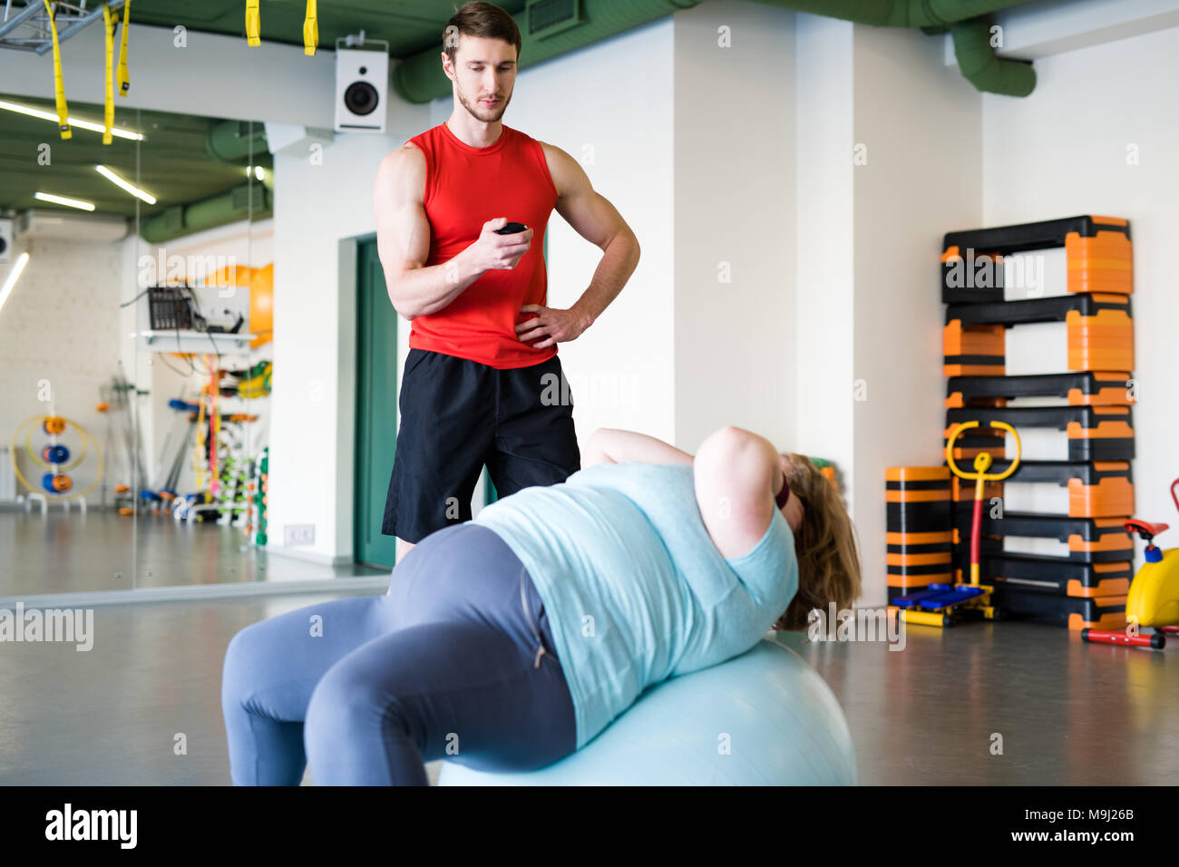Obese man gym work out hi-res stock photography and images - Alamy