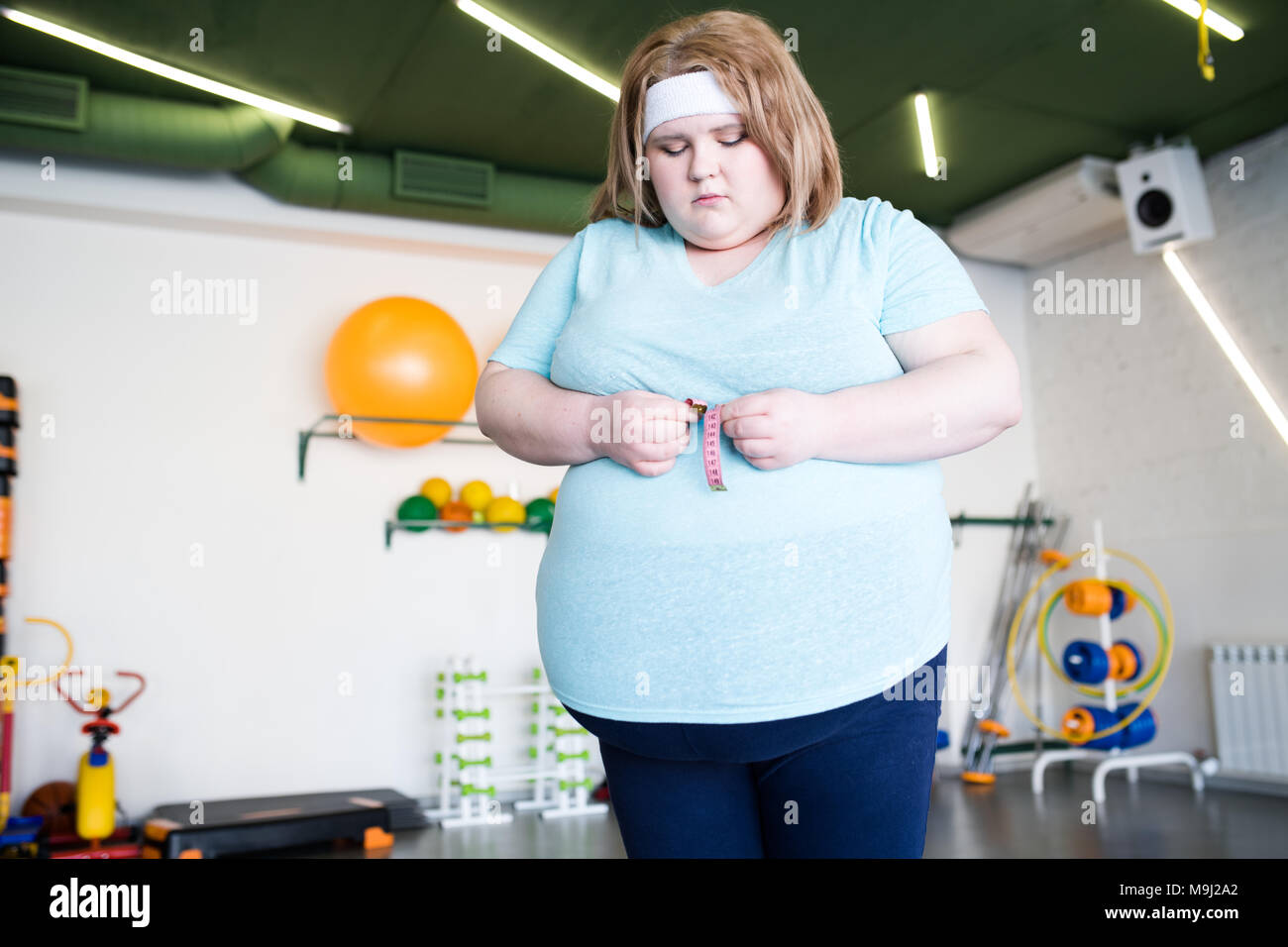 Woman sad work overweight hi-res stock photography and images - Alamy