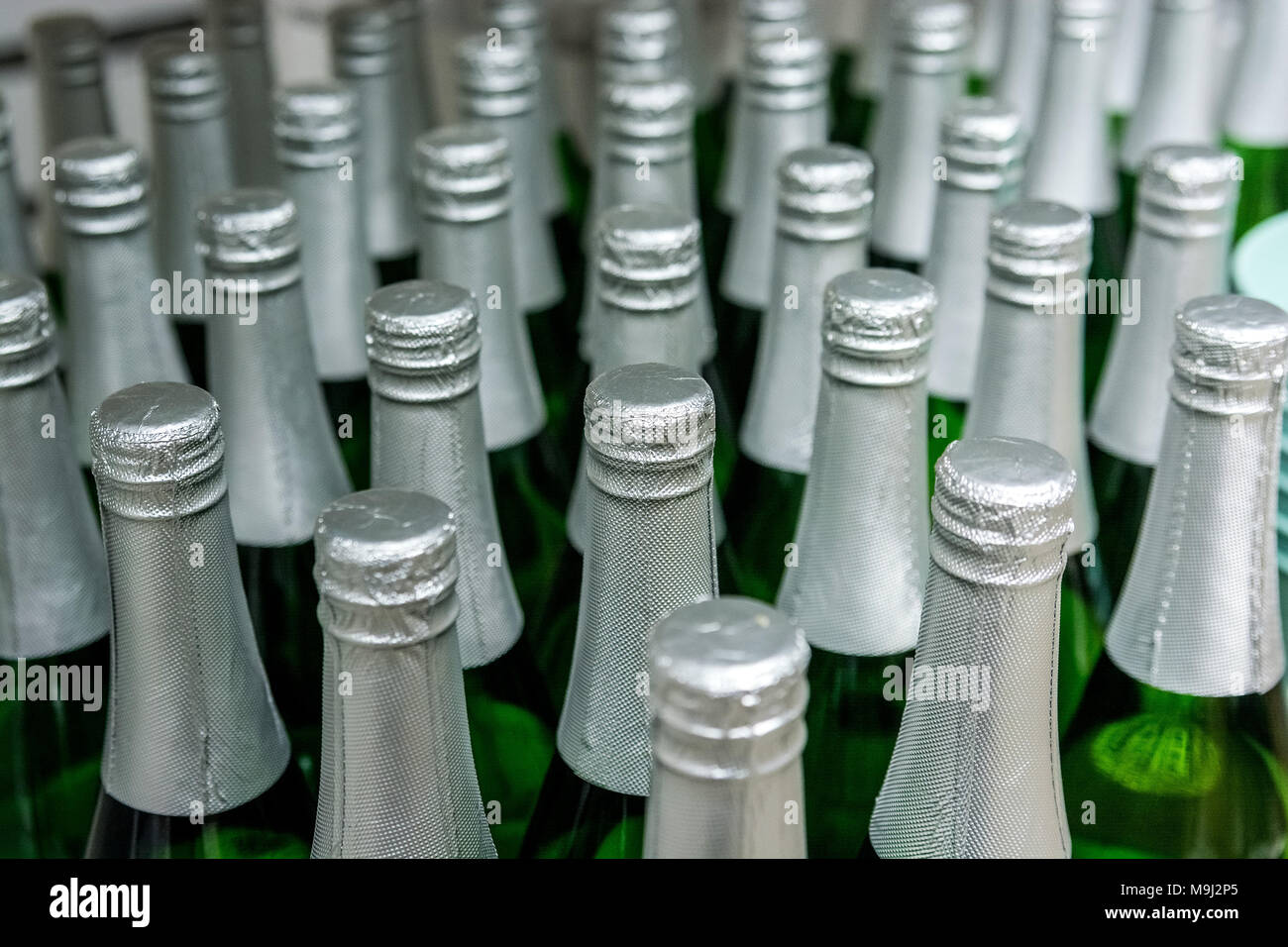 Close up champagne bottles in supermarket Stock Photo - Alamy
