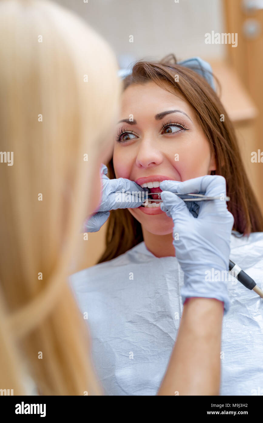 Woman open mouth mirror checking hi-res stock photography and images ...