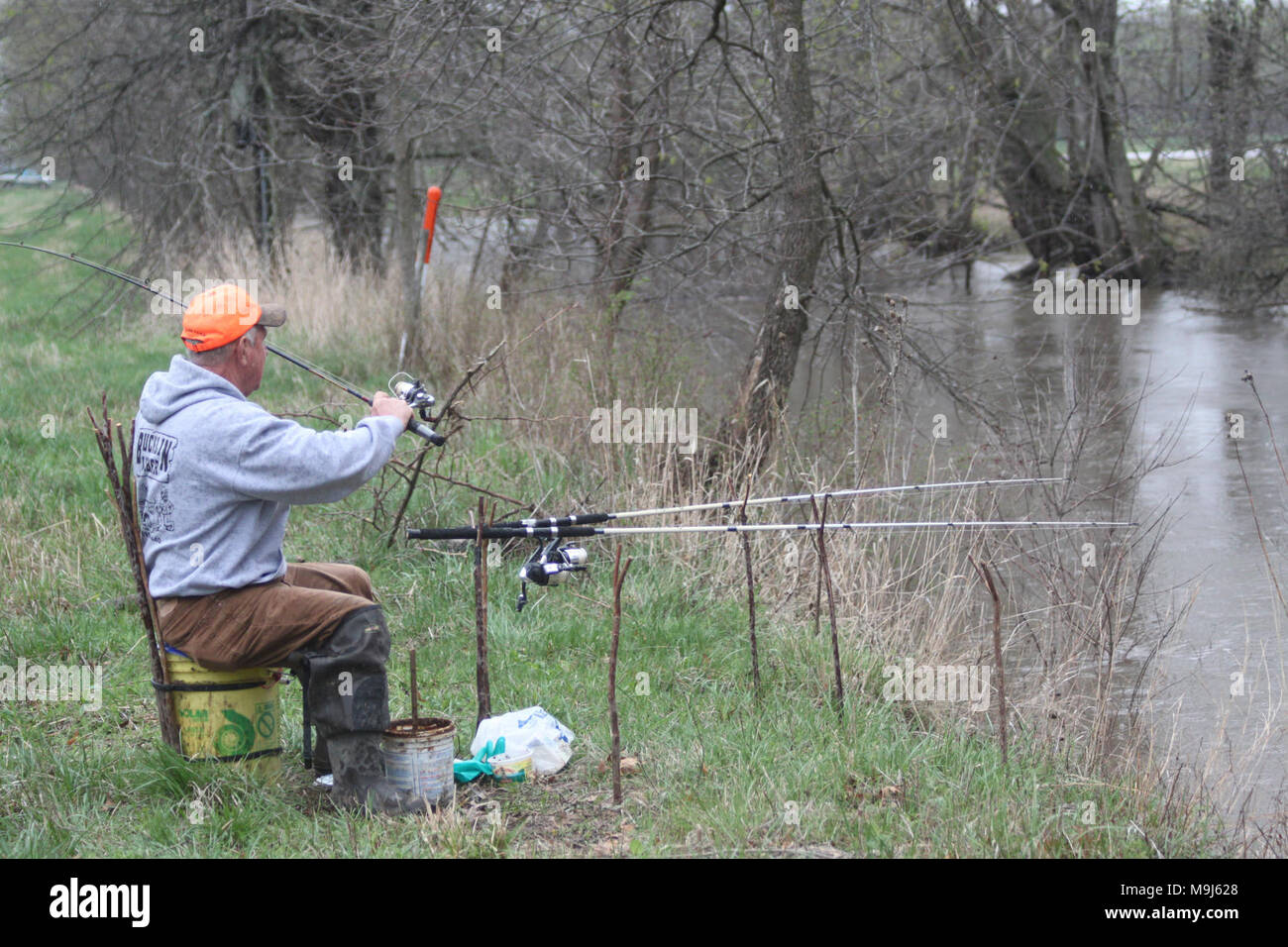 Elderly angler river fishing Stock Photo - Alamy