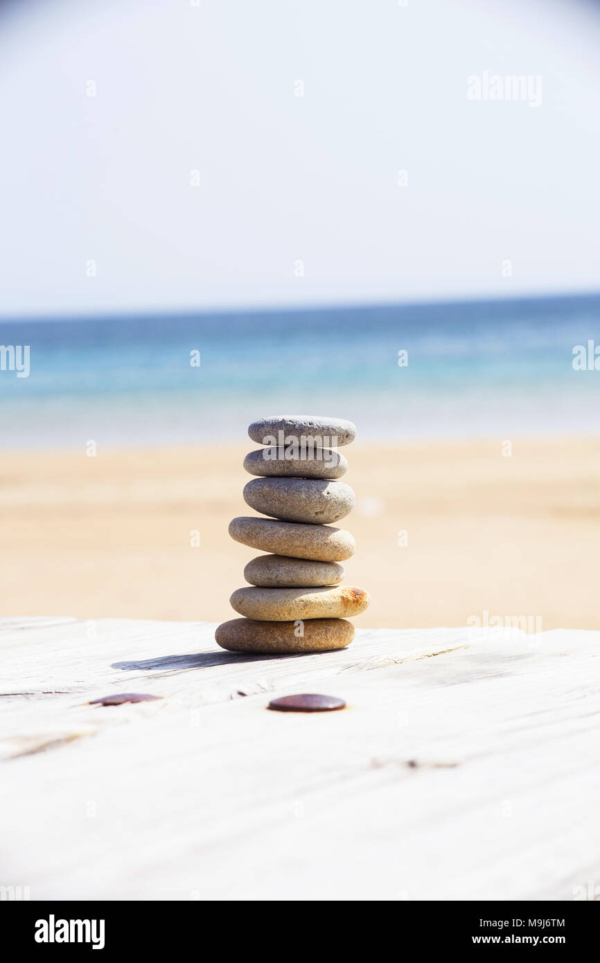 Zen stones on a sand beach Stock Photo - Alamy
