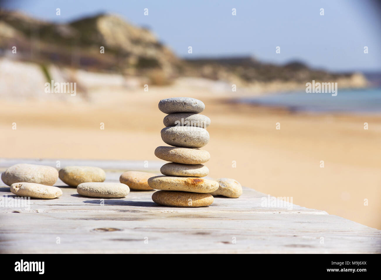 Zen stones on a sand beach Stock Photo - Alamy