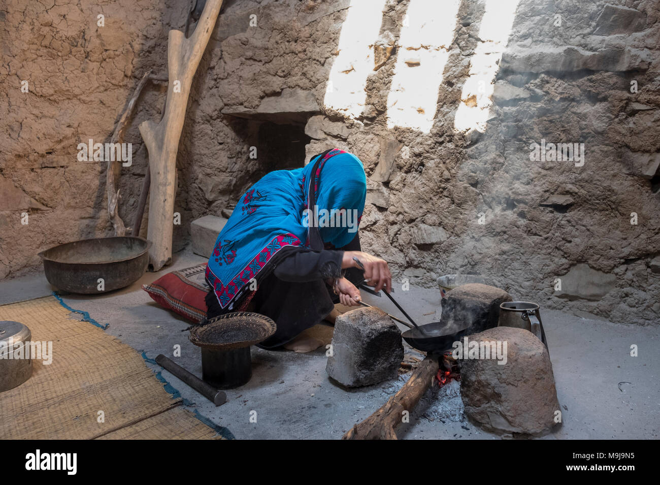 AL Hamra, Oman, March, 24th, 2018: omani woman in traditional kitchen ...