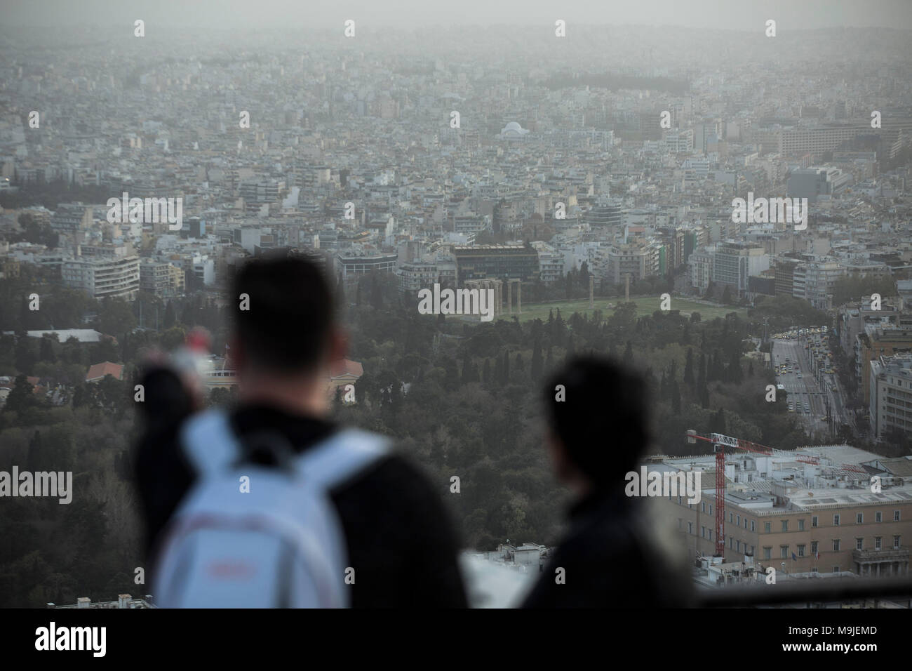Athens, Greece. 26th Mar, 2018. Tourists overlook the city of Athens ...