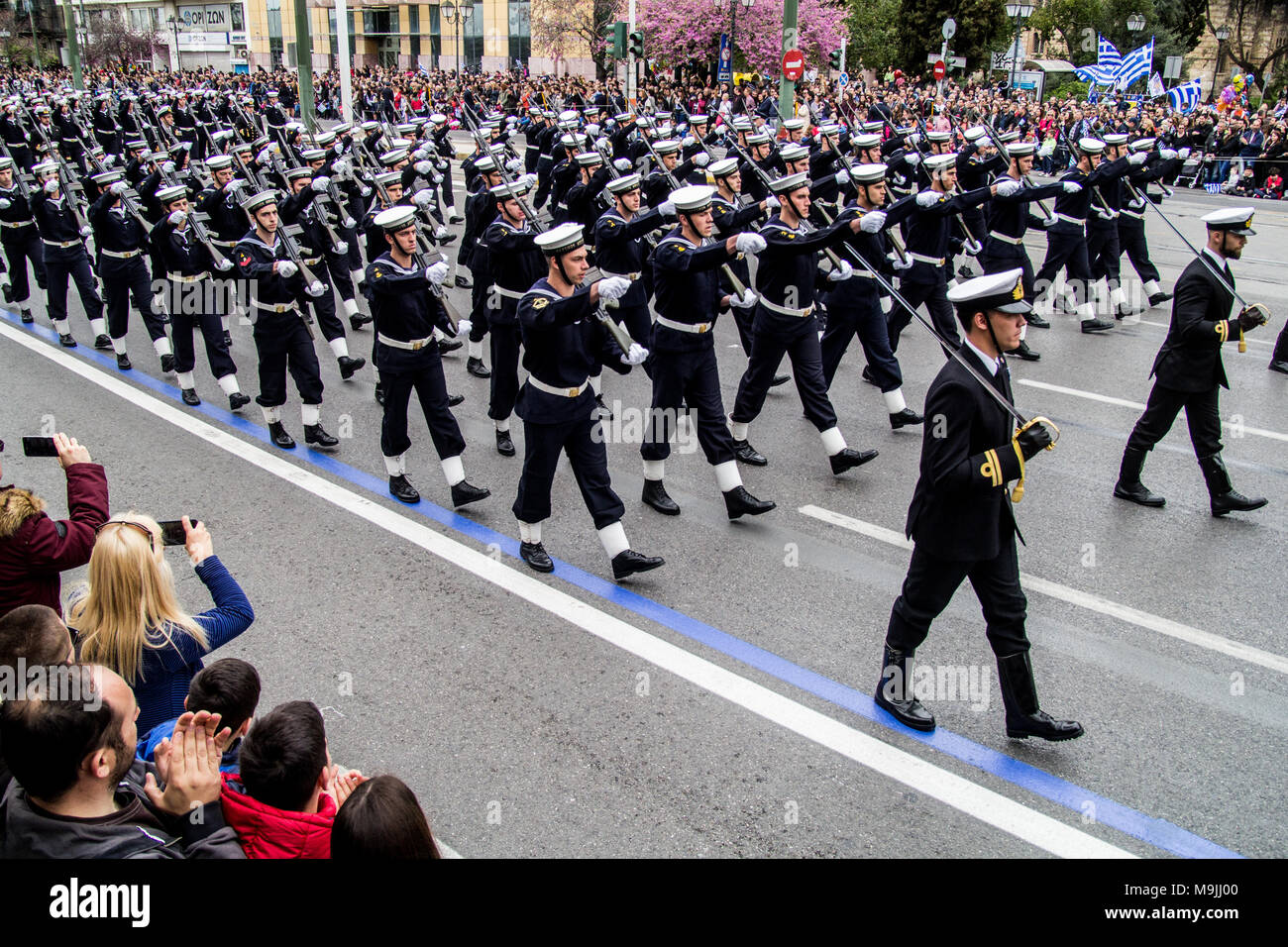 Naval Academy cadets are seen marching during the parade. A military ...