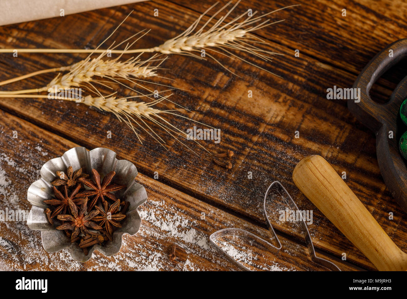 Still life on the texture tree. Figured baking dish filled with badges ...