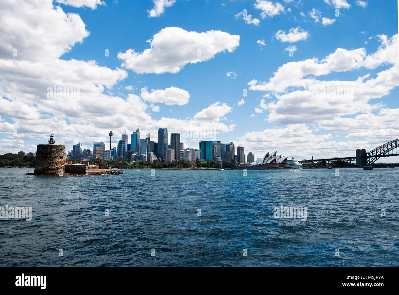 The city skyline of Sydney with lighthouse Stock Photo - Alamy