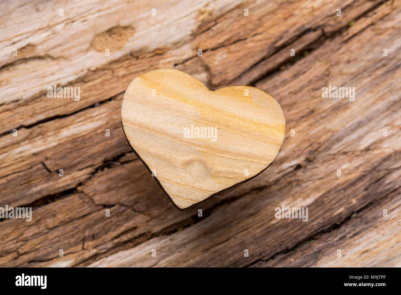 Wooden heart shape background Stock Photo - Alamy