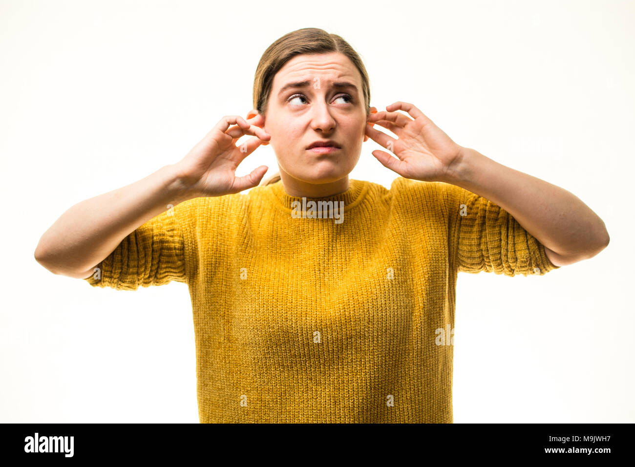 Noise Pollution A Young Caucasian Woman Girl With Her Fingers In Her 2938