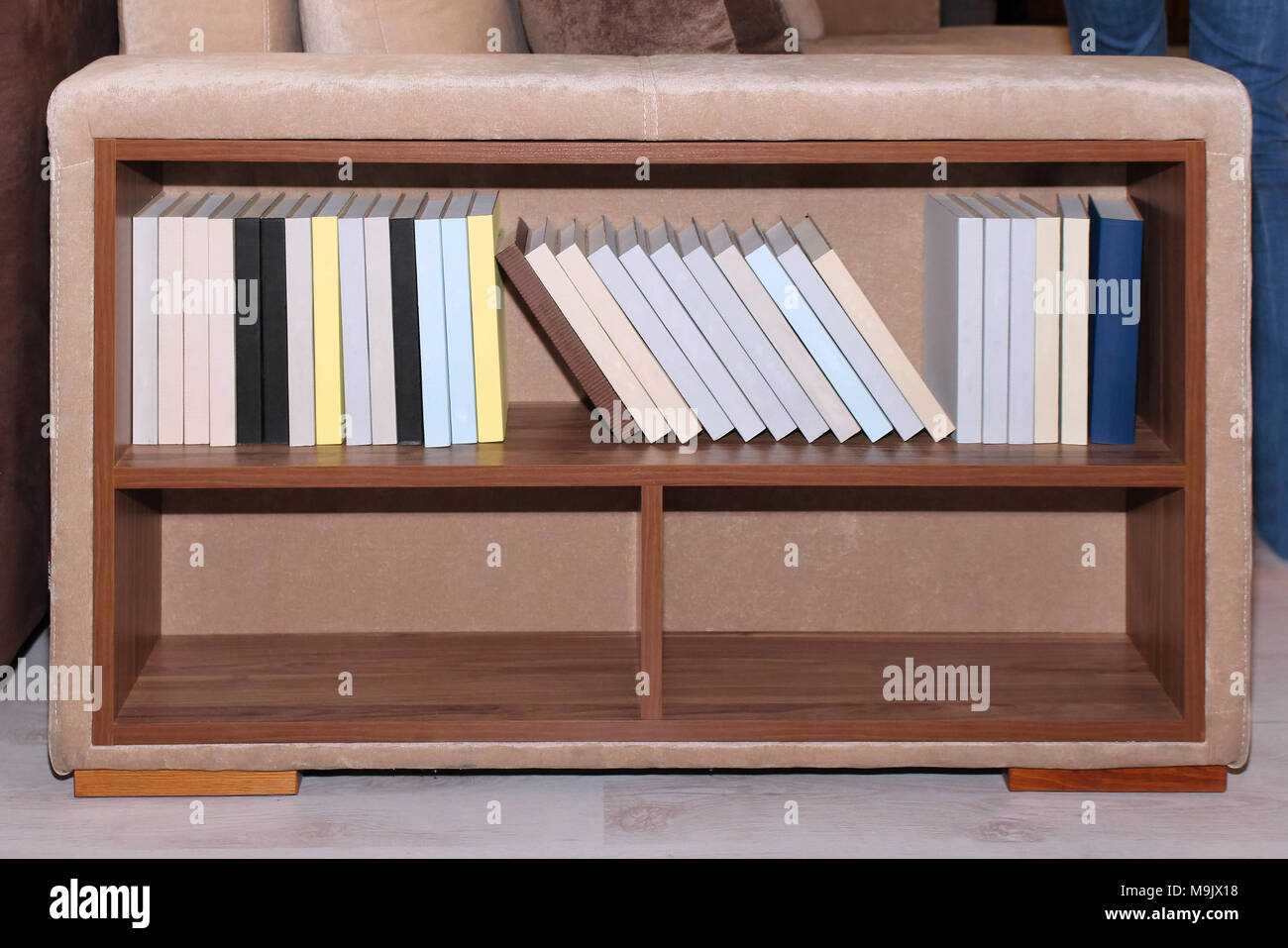 New books arranged in stack on wooden shelf Stock Photo - Alamy
