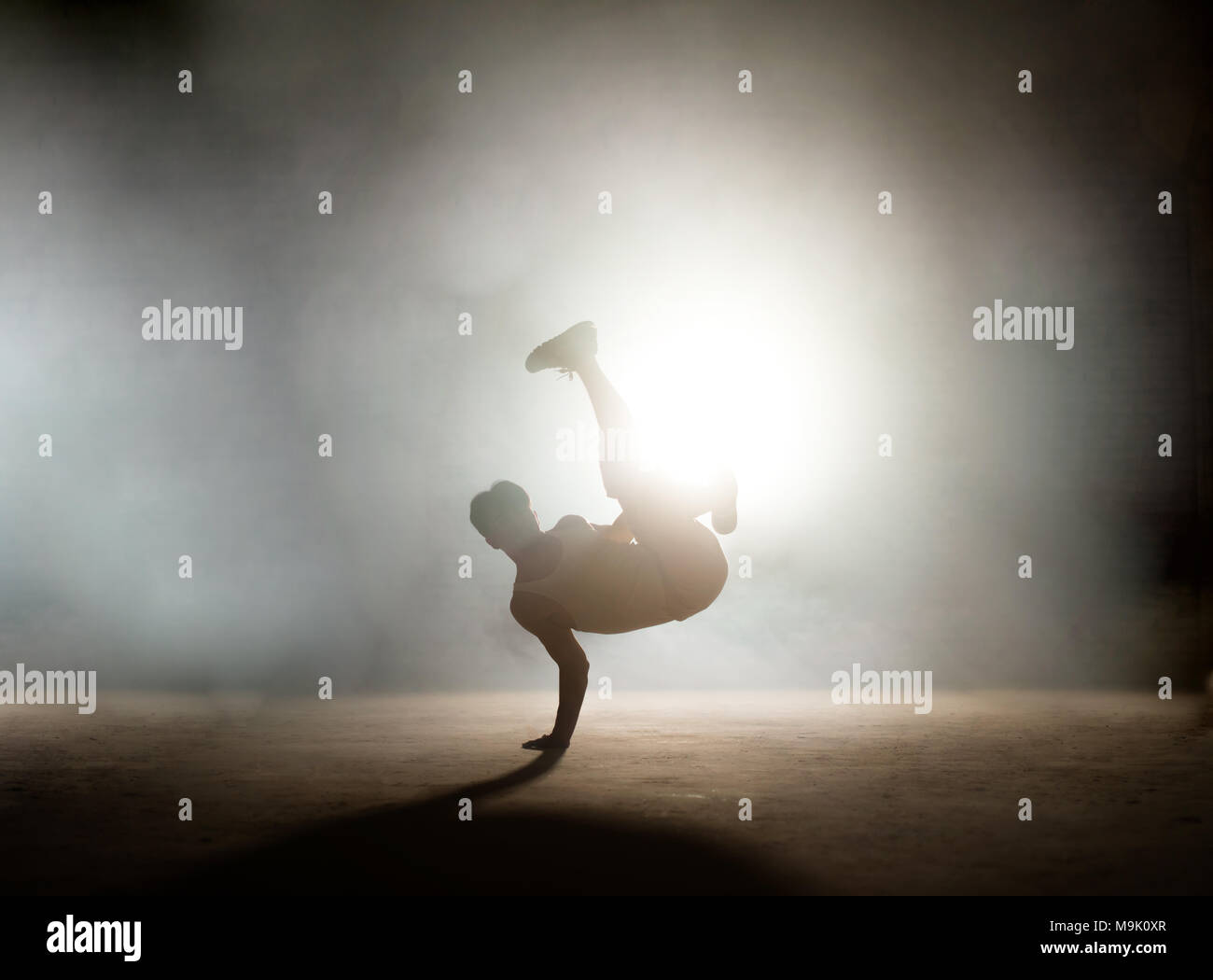 concept of stand on arm in break dance. creative movement Stock Photo ...
