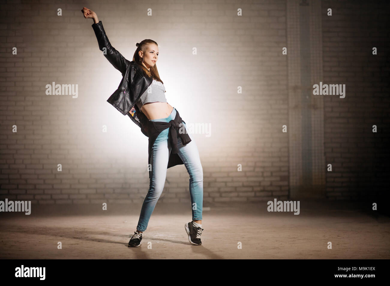 young street woman doing movements with hips. hip action. hip hop ...