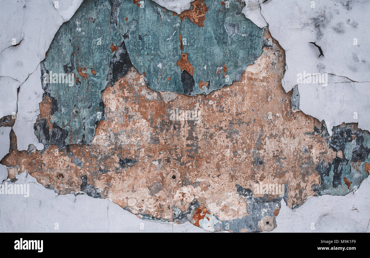 Damaged wall with flaked off paint background Stock Photo - Alamy