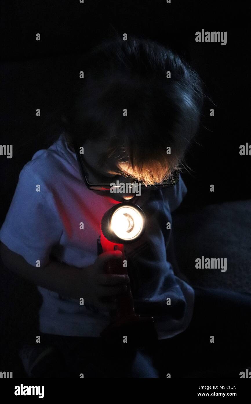 Child dark room hi-res stock photography and images - Alamy
