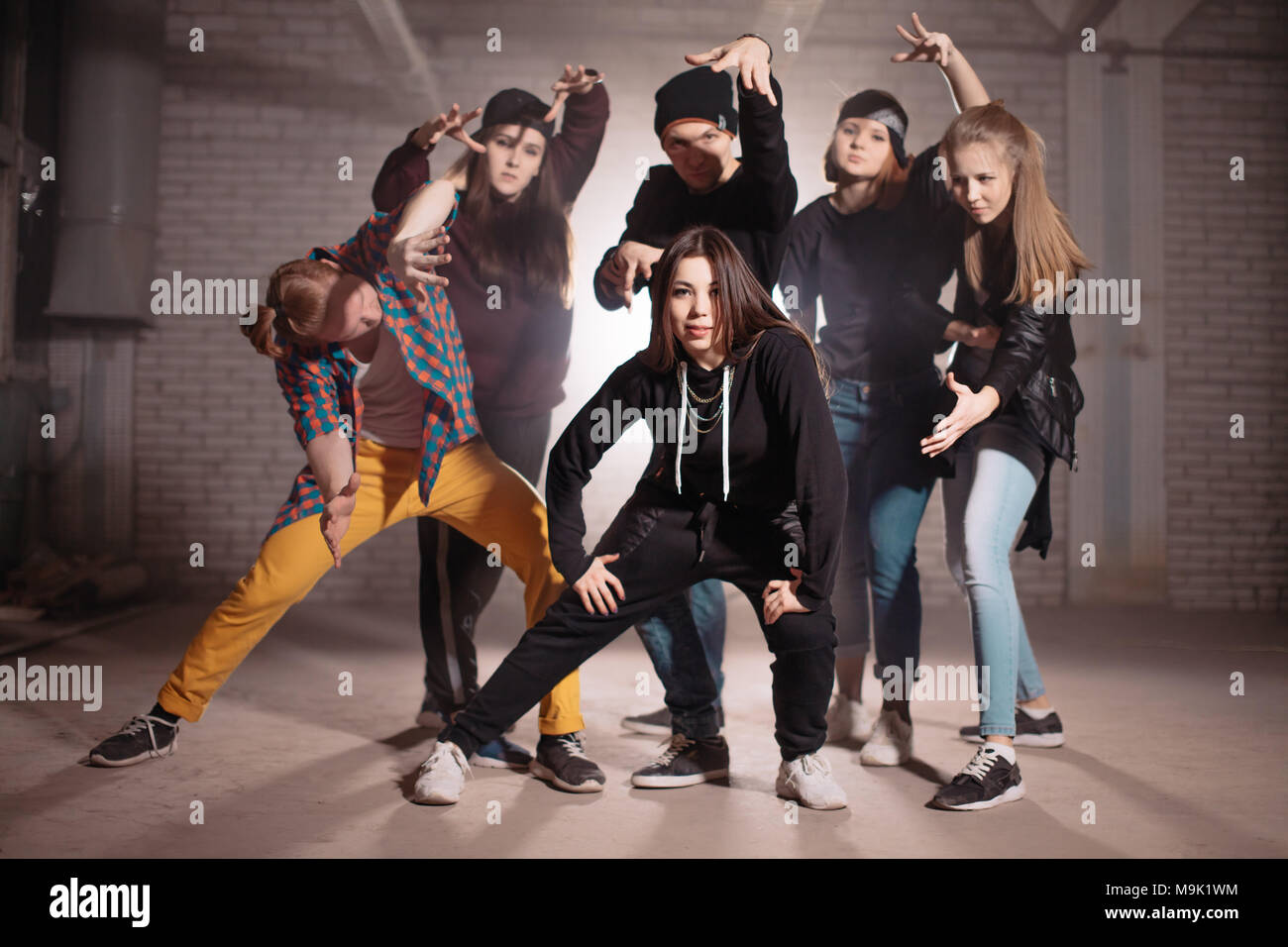 six Caucasian rappers are performing on the street. unforgettable ...