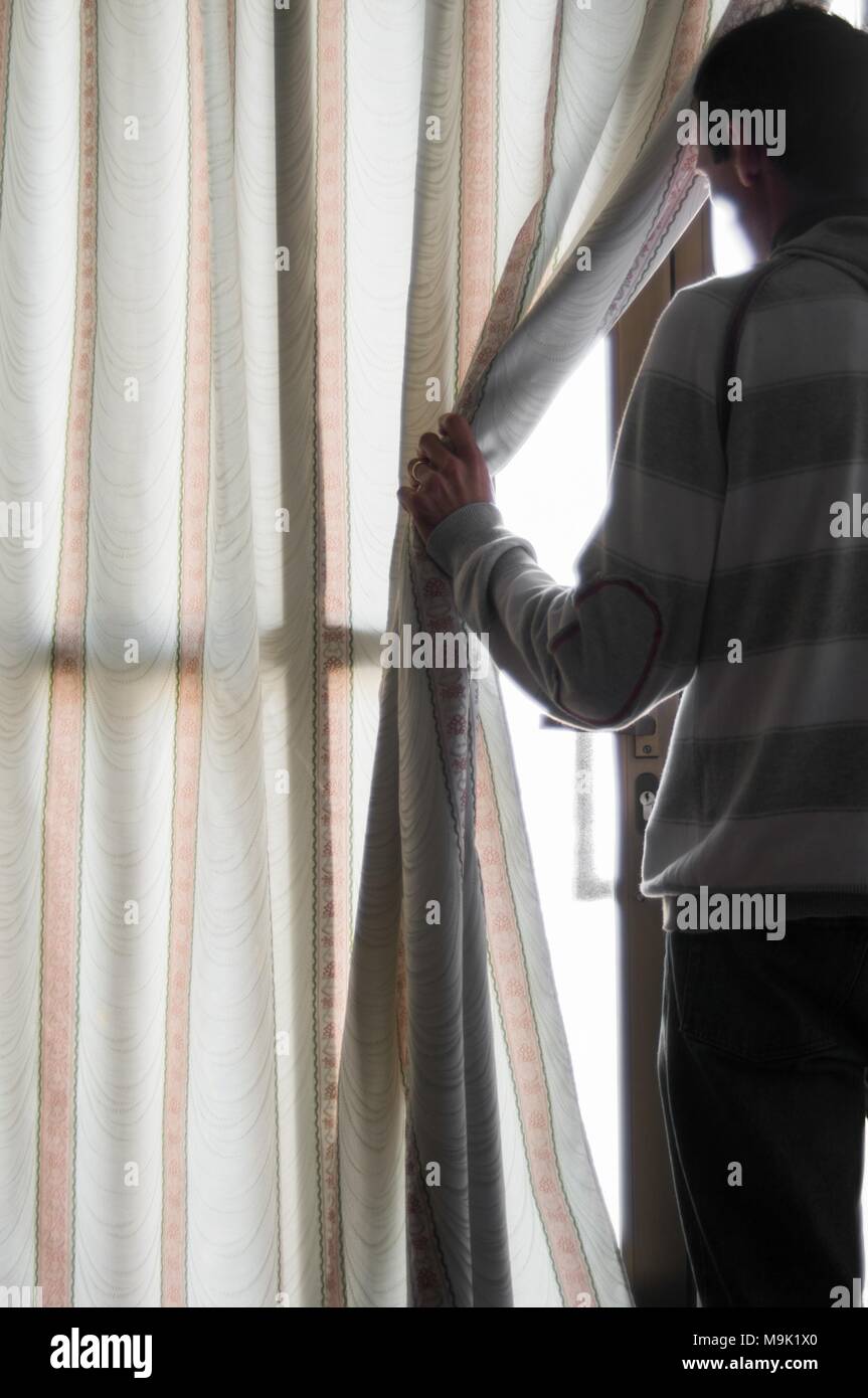 Man looking across room hi-res stock photography and images - Alamy