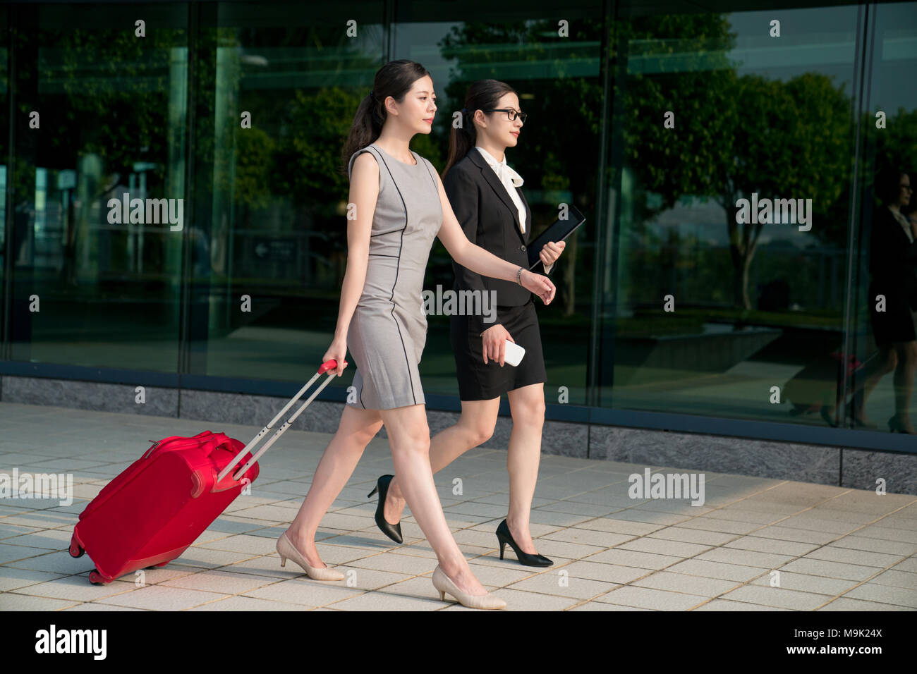 Commercial people walk in the hallway. They are going to attend the ...