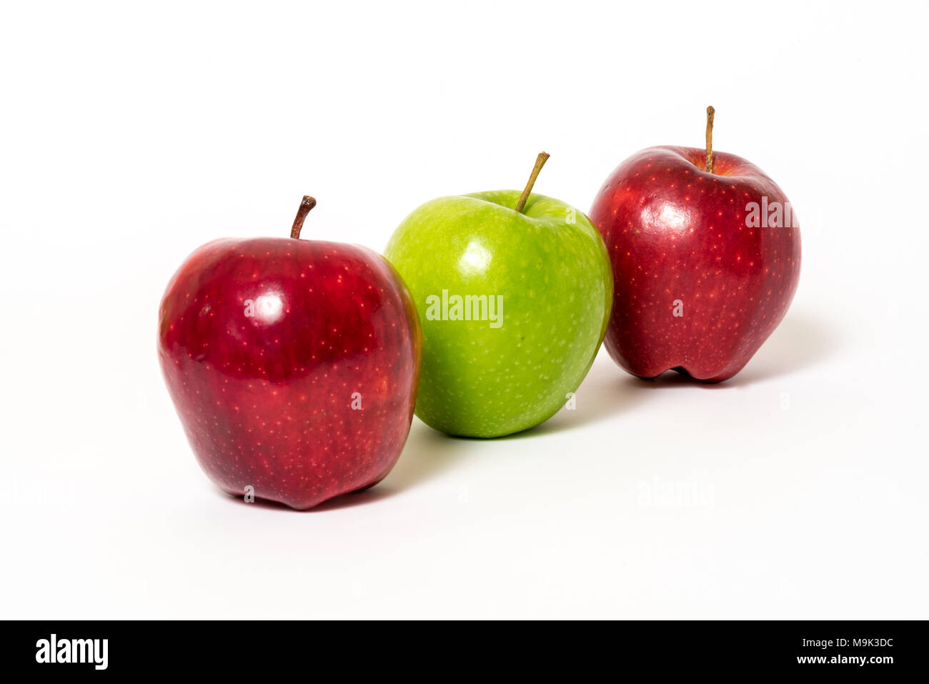 Three fresh apples isolated on white background Stock Photo - Alamy
