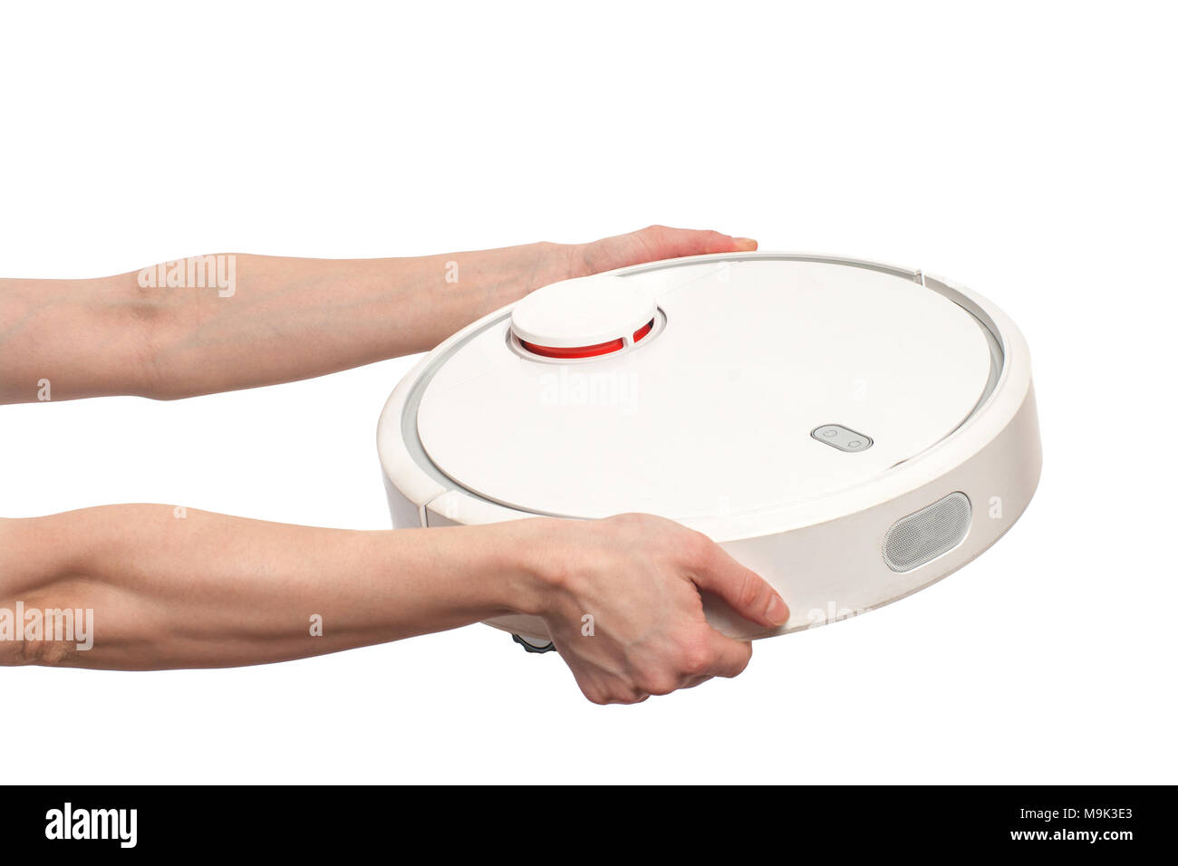 Woman holding robotic vacuum cleaner isolated on white background Stock ...