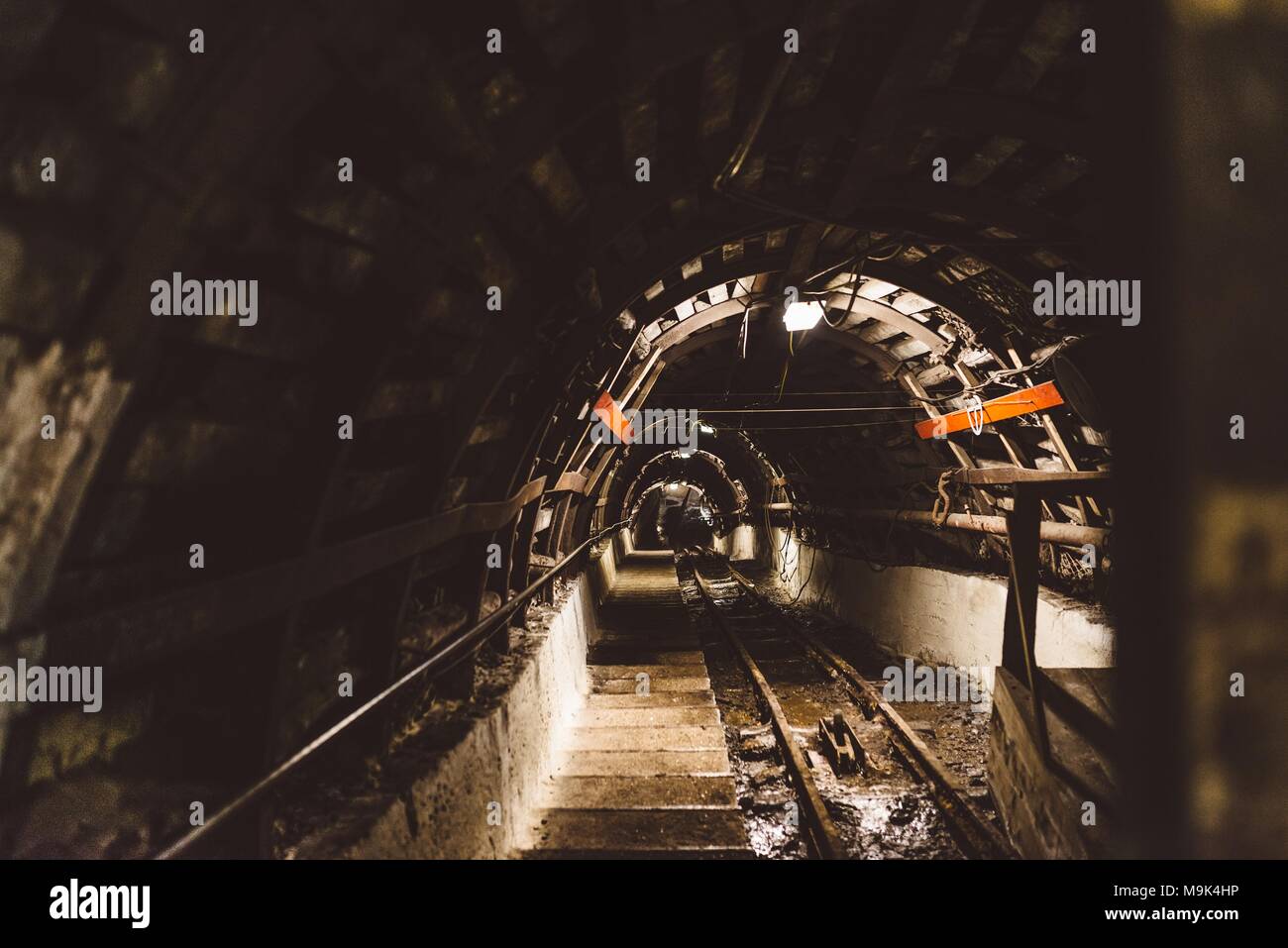 Underground black coal mine with rail tracks. Black coal mine, Silesia ...