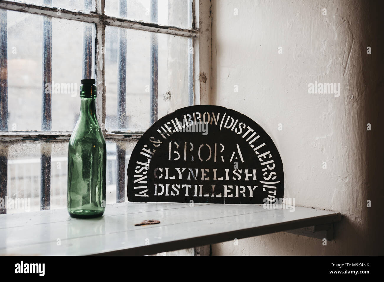Metal name sign inside Brora distillery, Scotland. The distillery is ...