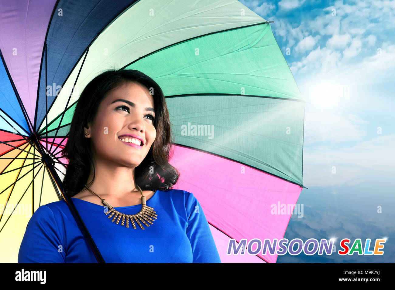 Smiling asian woman with umbrella. Monsoon sale concept Stock Photo - Alamy