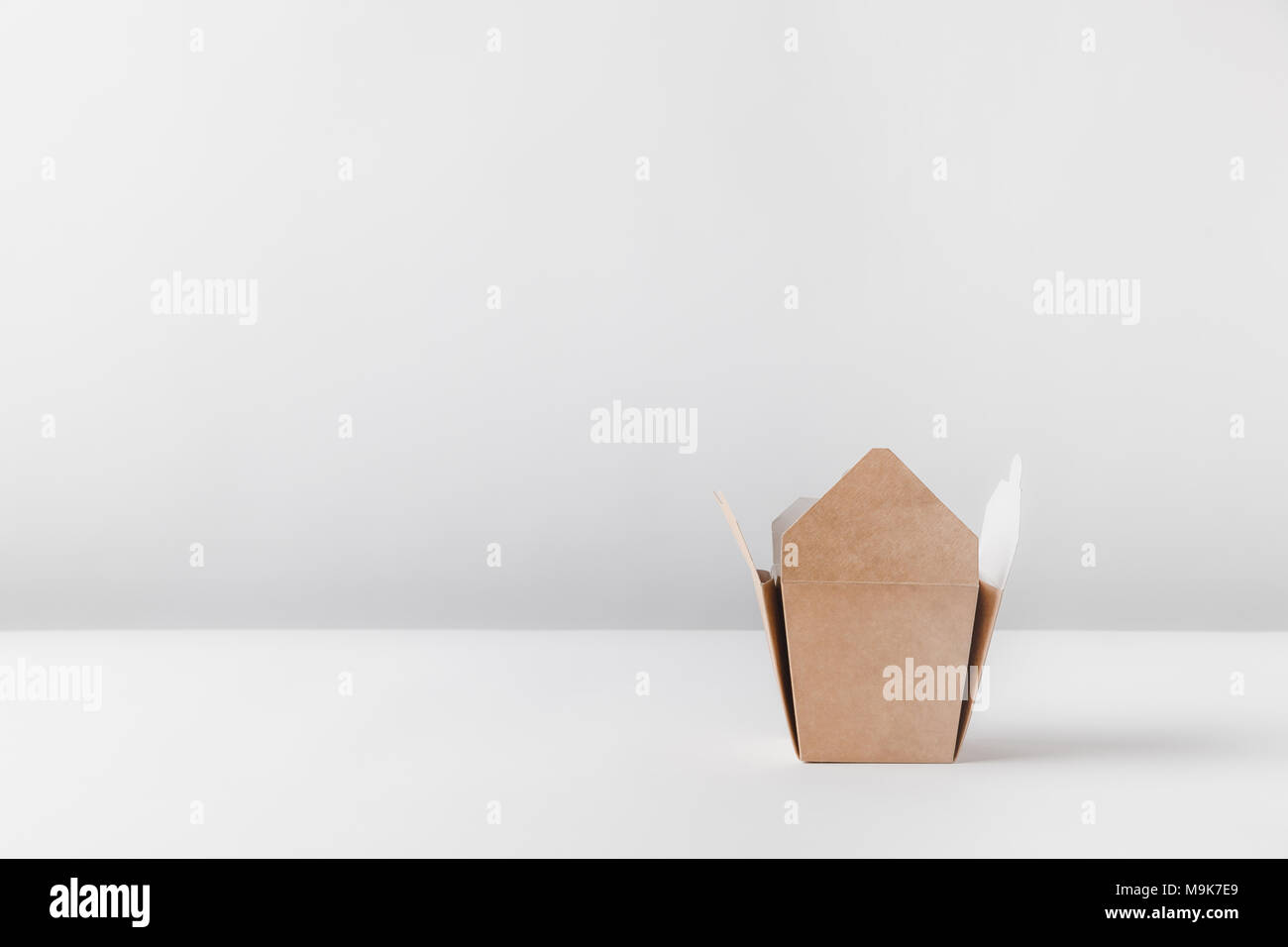 one noodles box on white table Stock Photo - Alamy