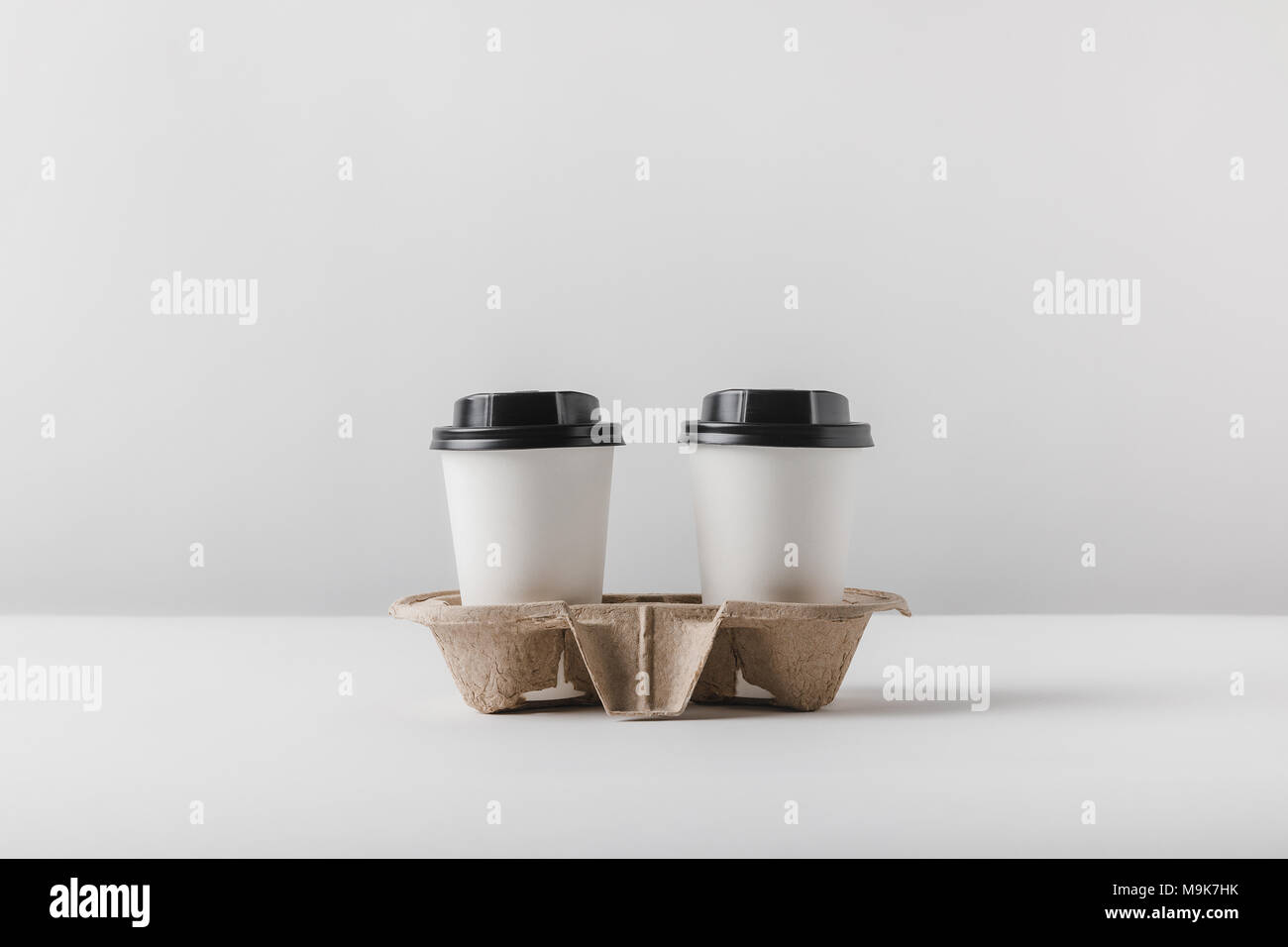 Two white paper cups hi-res stock photography and images - Alamy