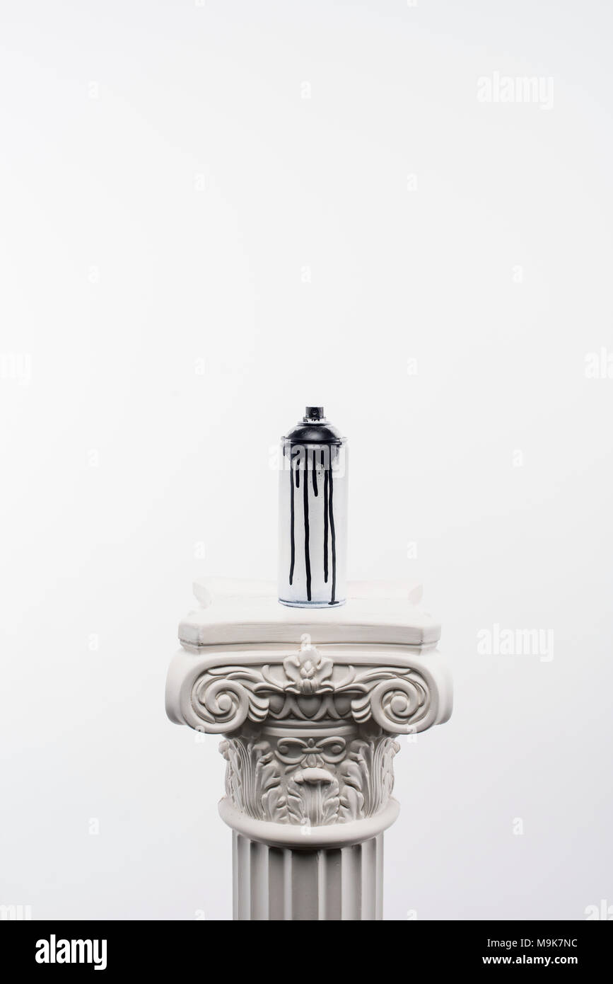 close up view of spray paint in can standing on column isolated on ...