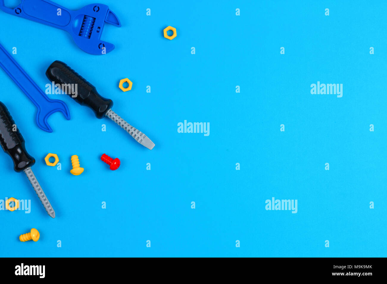 Toys background. Kids toys top view. Toy tools on blue background Stock ...