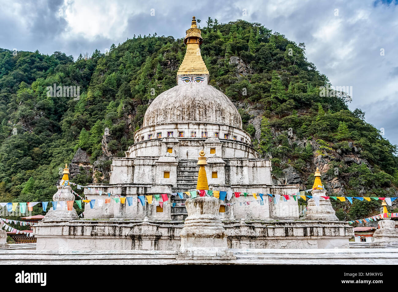 Buddhist chorten with prayer flags hi-res stock photography and images ...