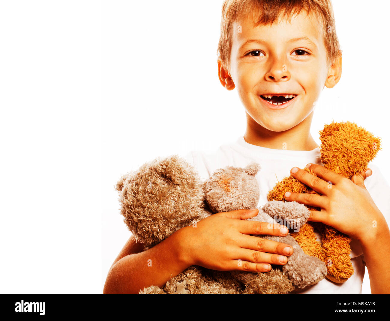 little cute boy with many teddy bears hugging isolated close up Stock ...